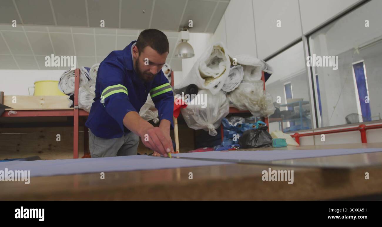 Leaning craftsman marking cutting hi-res stock photography and images ...