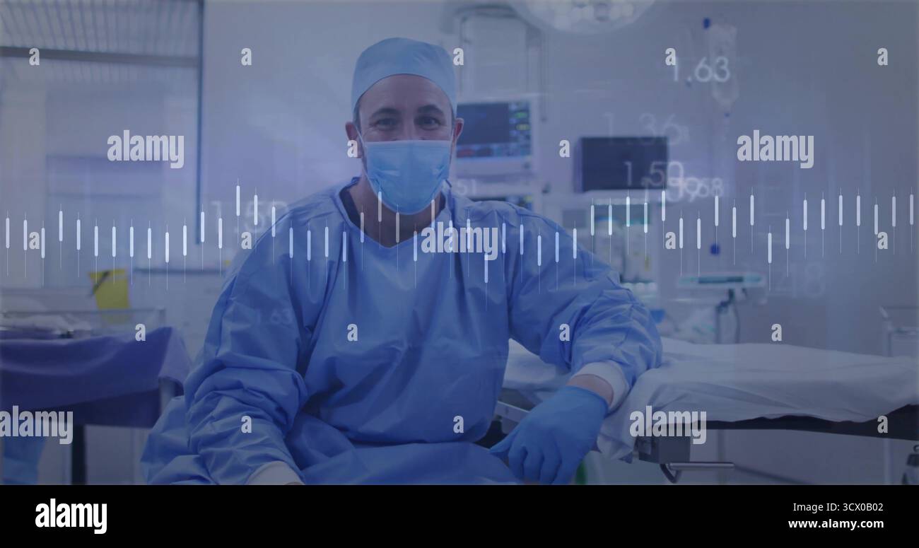 Sitting male surgeon preparing for procedure at sterile surgical suite ...