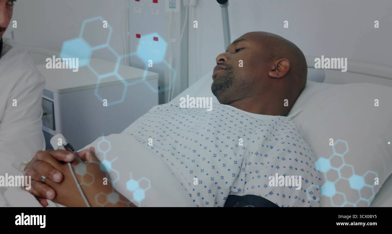 White coat doctor holding gown-clad patient hands on hospital bed, with ...