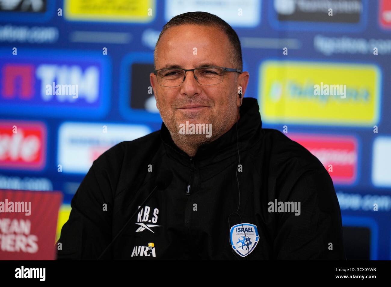 Israel coach Ran Ben Simon attends a news conference ahead of Tuesday's ...