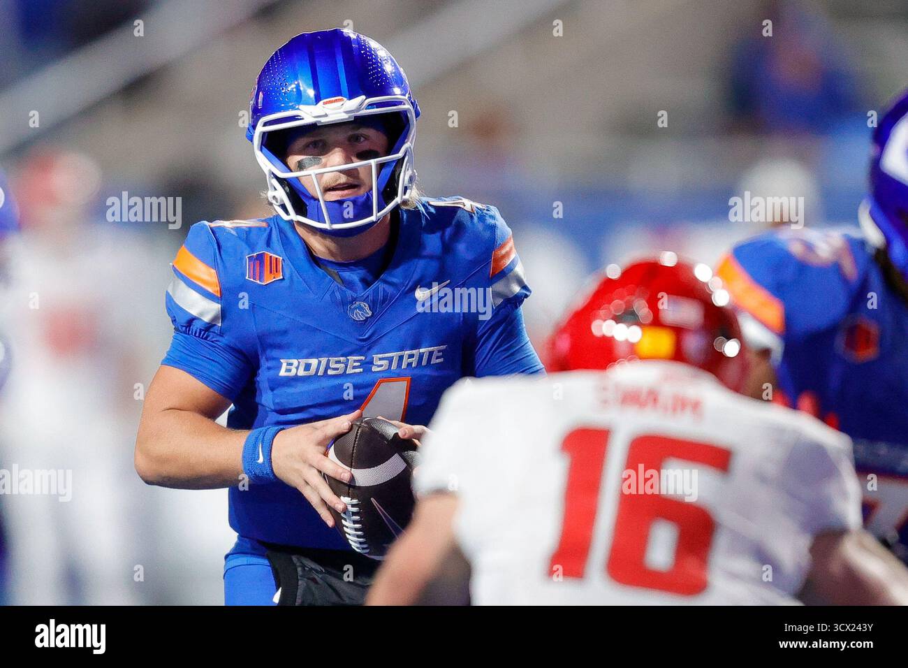 Boise State quarterback Maddux Madsen (4) looks over the New Mexico ...
