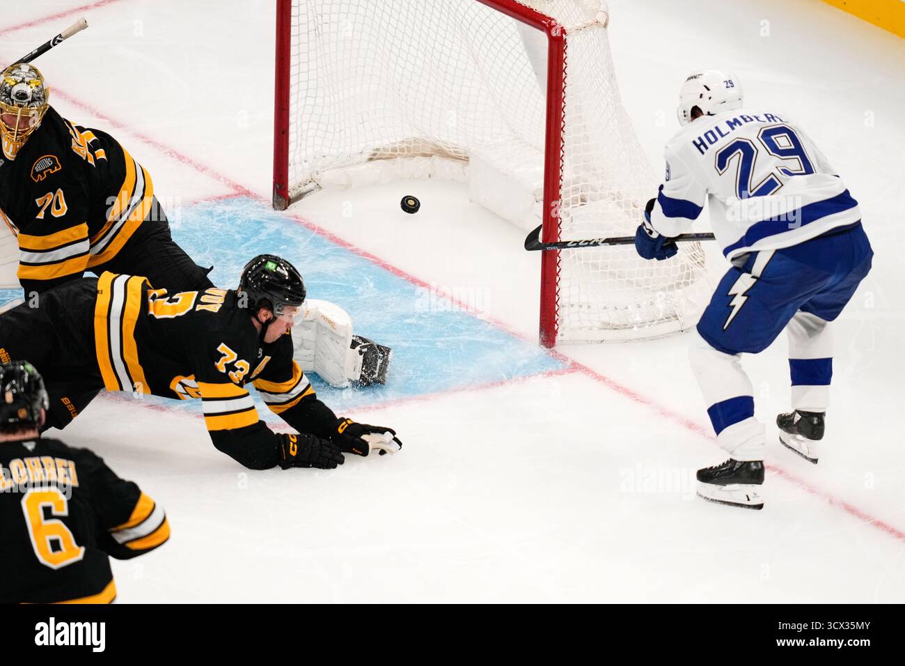 Tampa Bay Lightning right wing Pontus Holmberg (29) pokes the puck into ...