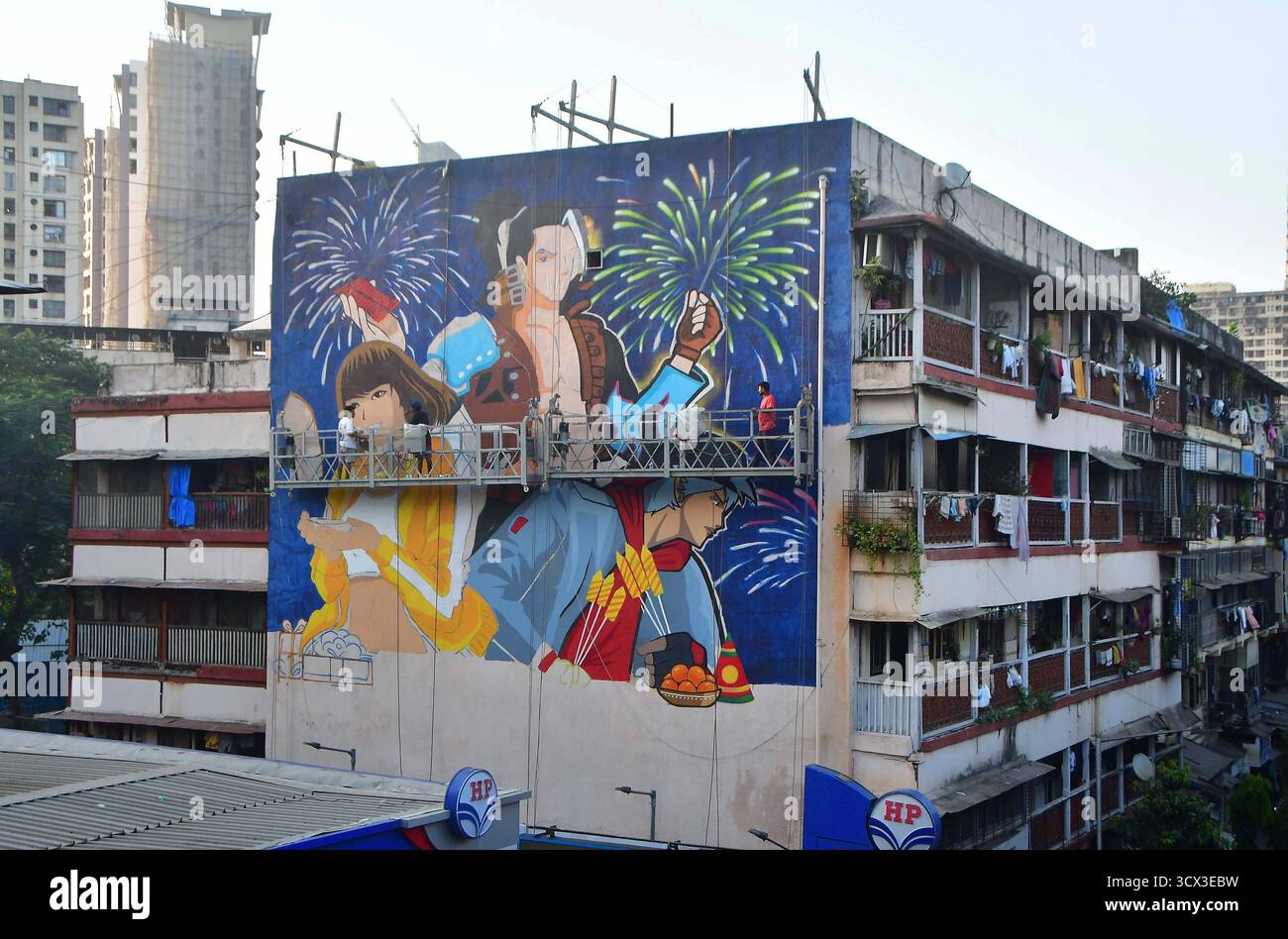 MUMBAI, INDIA - OCTOBER 13: Artisans create Diwali graffiti on a ...