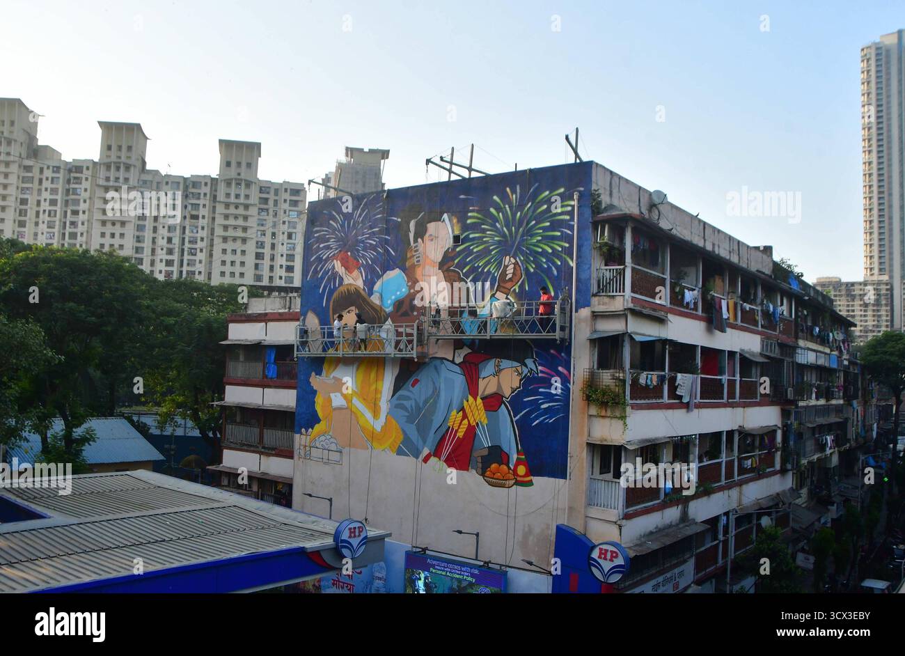 MUMBAI, INDIA - OCTOBER 13: Artisans create Diwali graffiti on a ...
