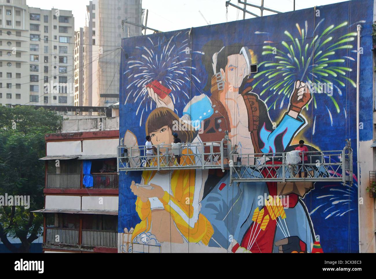 MUMBAI, INDIA - OCTOBER 13: Artisans create Diwali graffiti on a ...