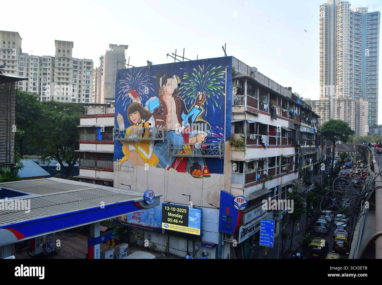 MUMBAI, INDIA - OCTOBER 13: Artisans create Diwali graffiti on a ...