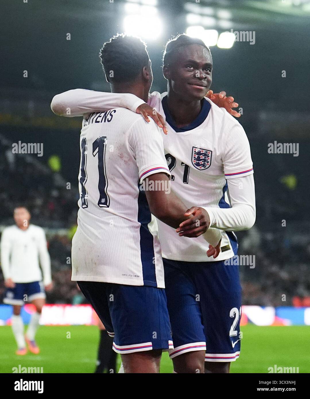 England's Tyrique George celebrates scoring their side's first goal of ...