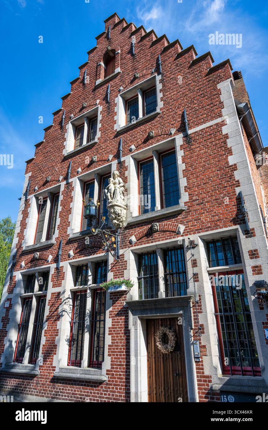 Stepped gable end of ornate red brick building on Begijnhof in the ...