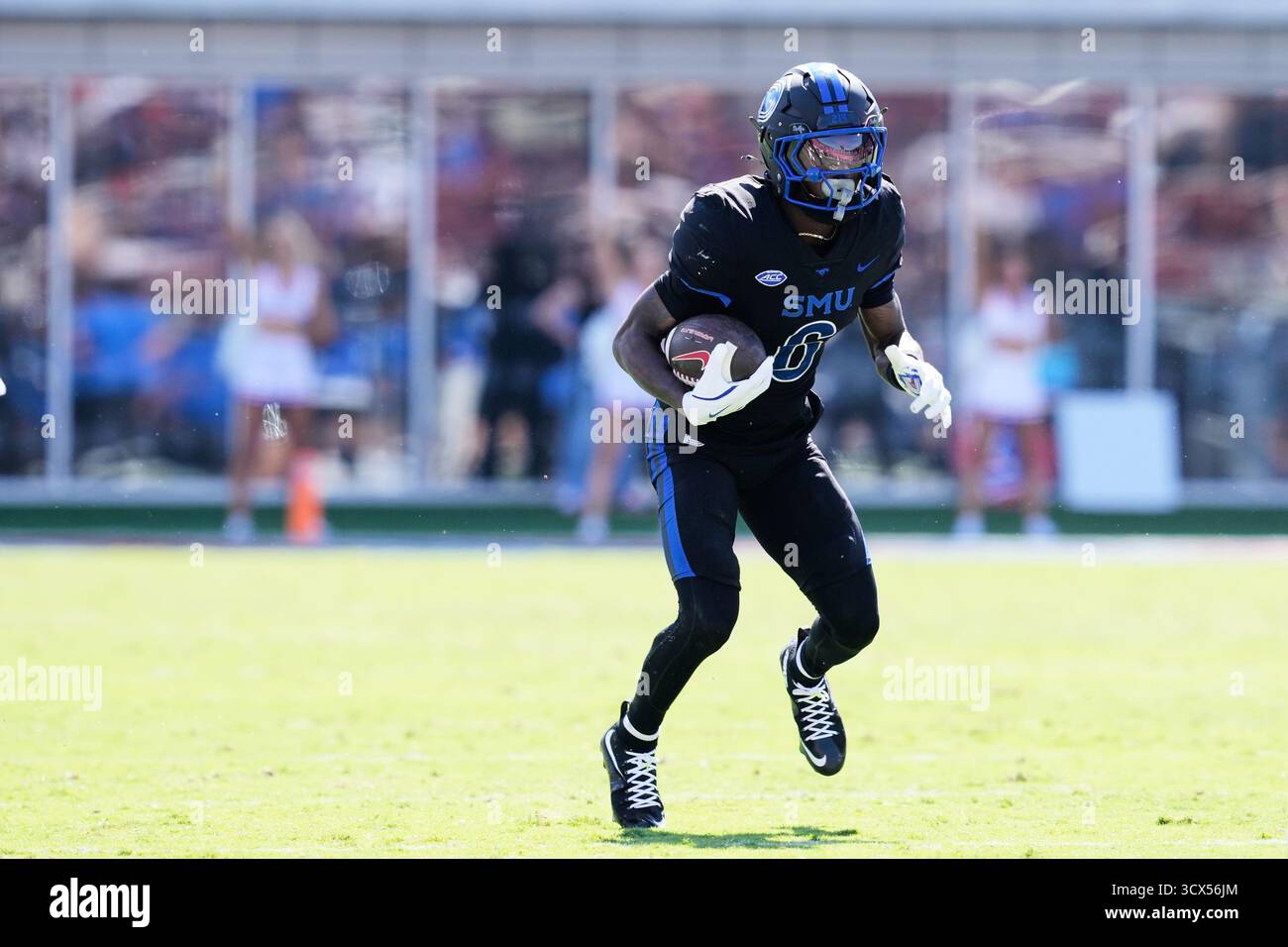 SMU running back Chris Johnson Jr. runs the ball against Stanford ...