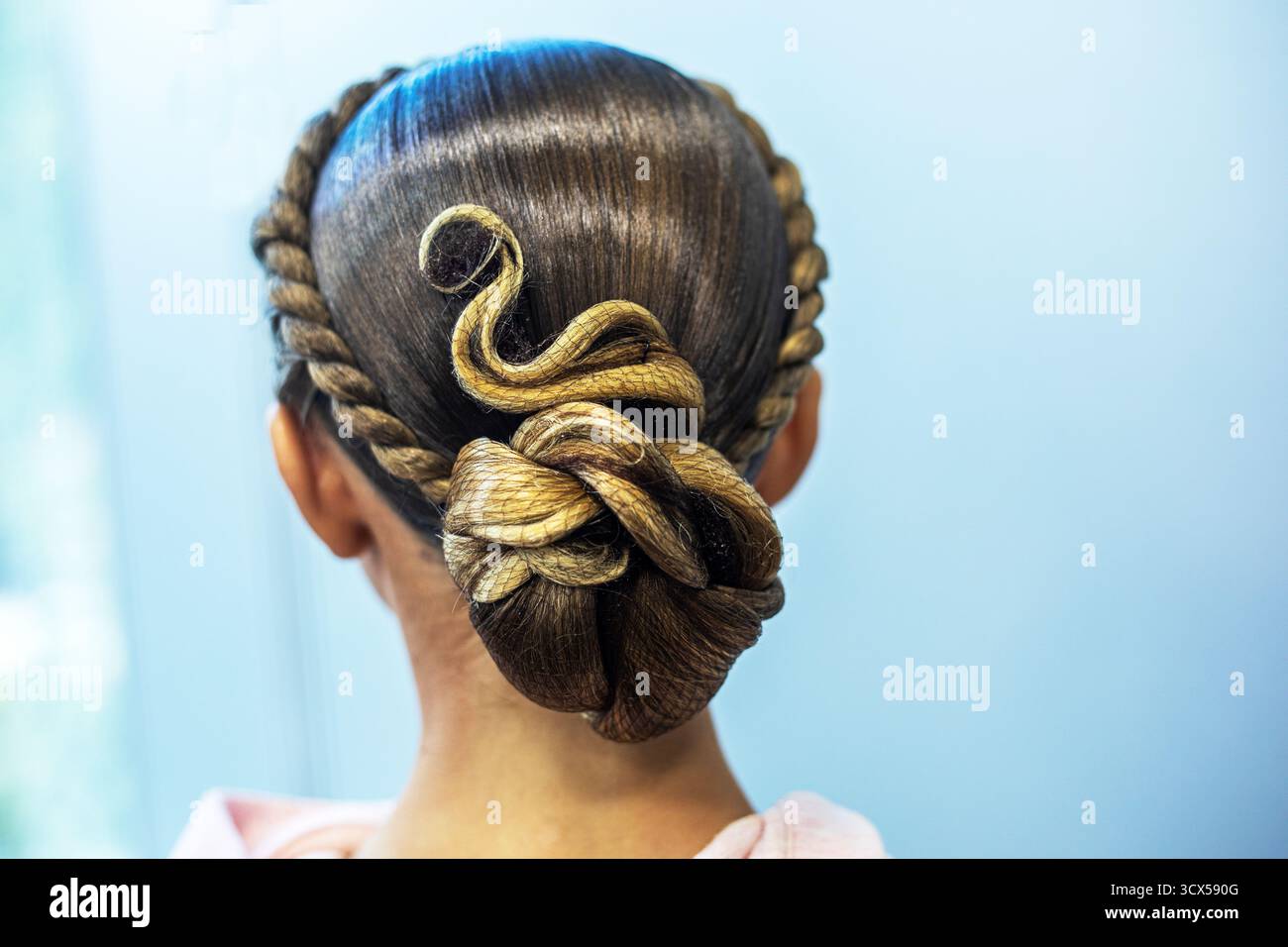 beautiful bun hairstyle for a young dancer for a dance competition ...