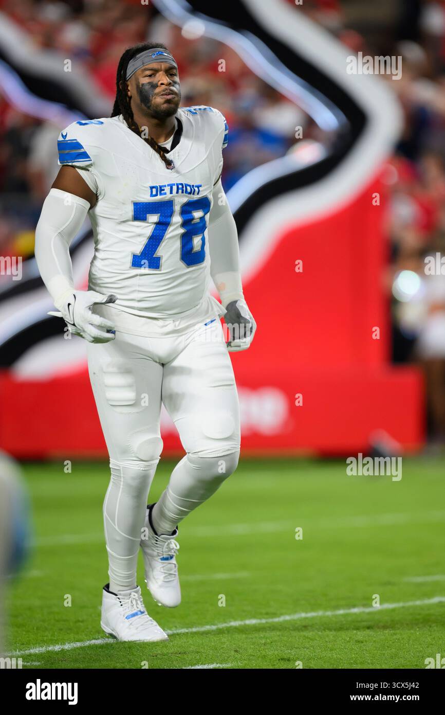Detroit Lions defensive end Tyler Lacy comes onto the field during ...