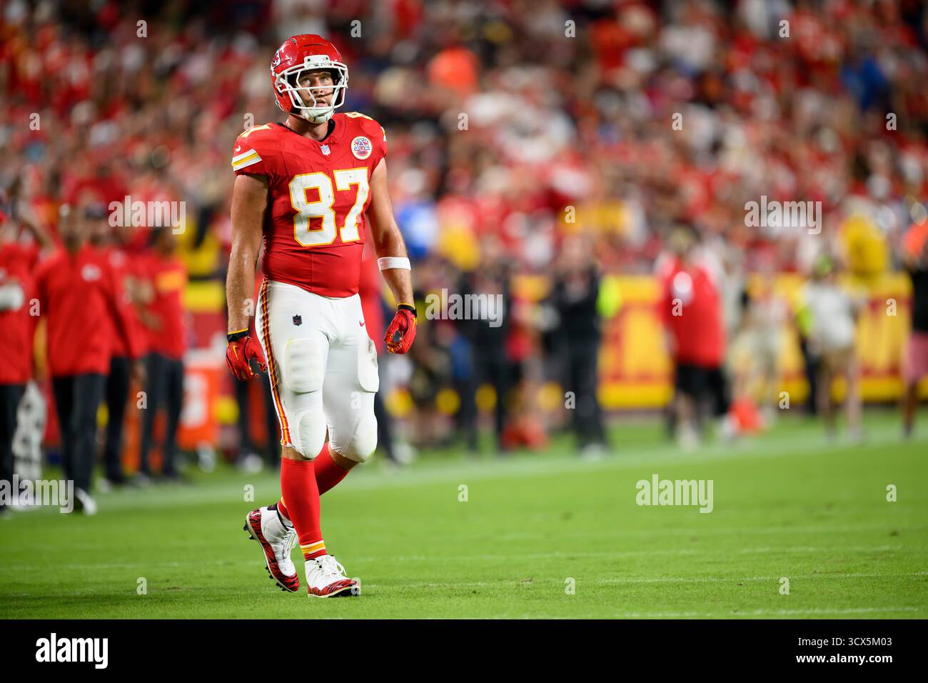 Kansas City Chiefs tight end Travis Kelce walks back to the huddle after a catch during the ...