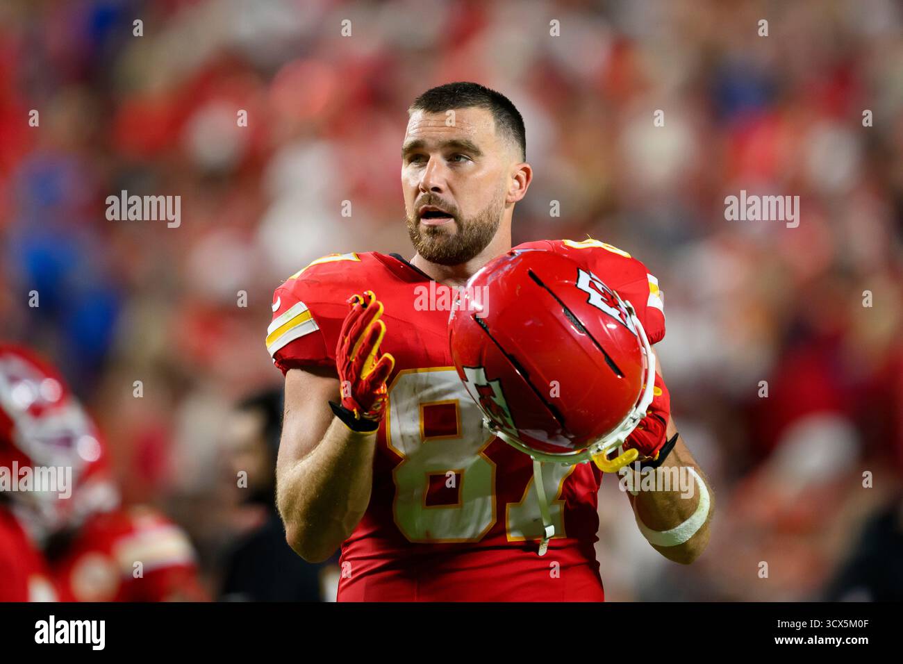 Kansas City Chiefs tight end Travis Kelce urges the crowd to cheer during the second half of an ...