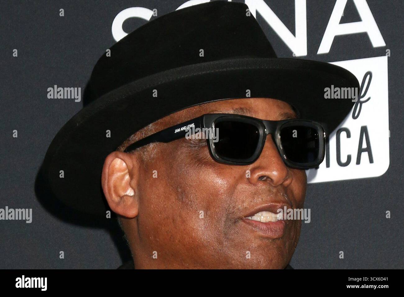 Terry lewis wearing jam and lewis sunglasses hi-res stock photography ...