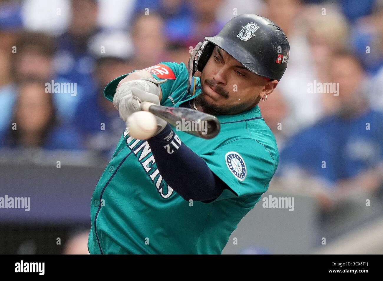 Seattle Mariners first baseman Josh Naylor (12) hits a single during ...