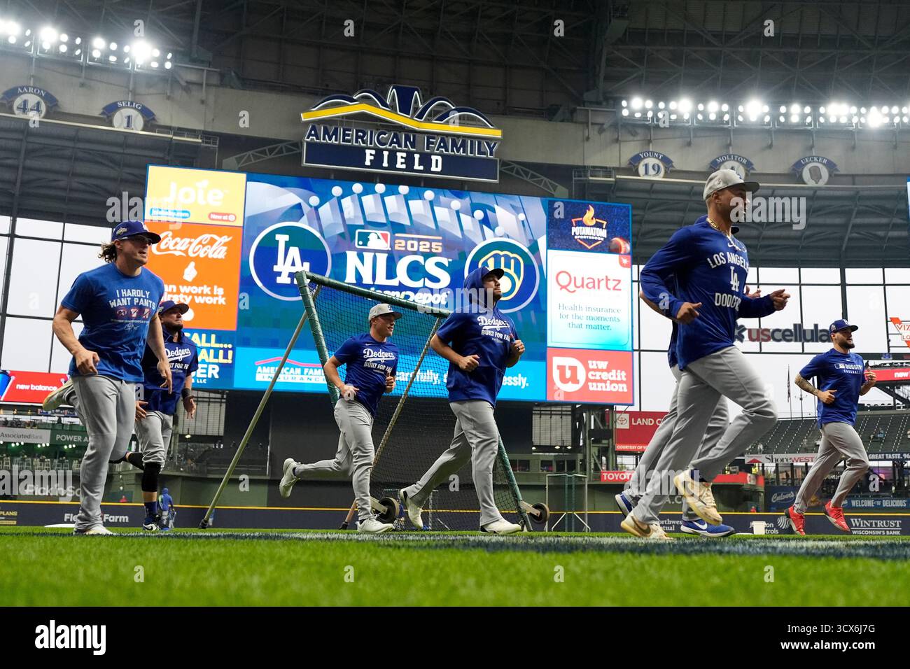 The Los Angeles Dodgers warm up before Game 1 of baseball's National ...
