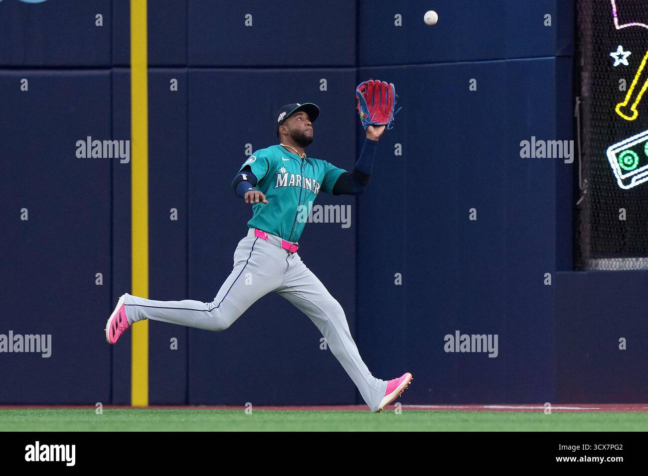 Seattle Mariners outfielder Victor Robles makes a catch in the outfield ...