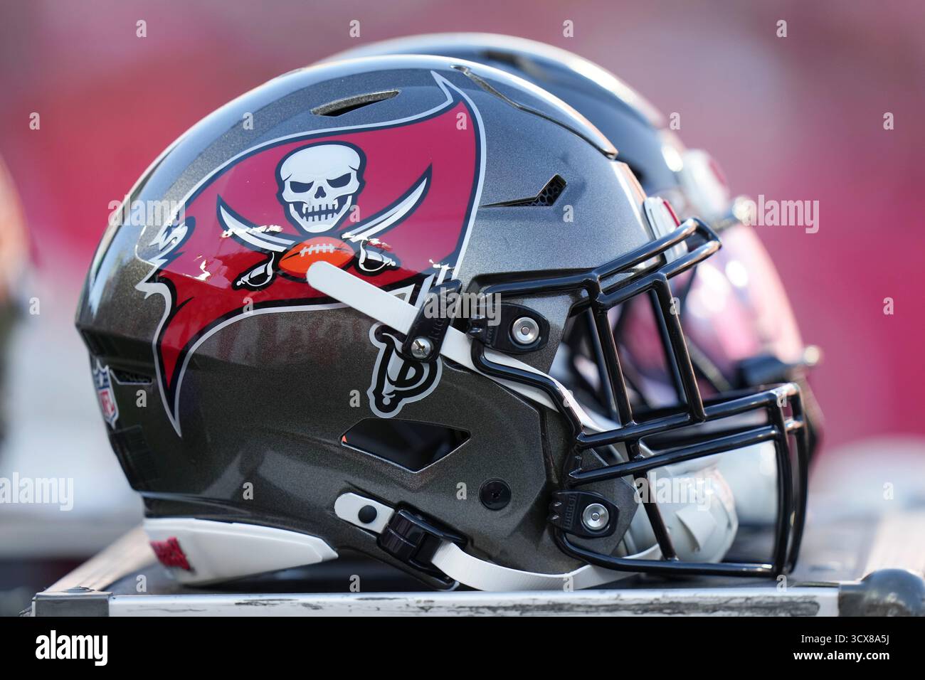 A Tampa Bay Buccaneers helmet rests on the sidelines during an NFL ...