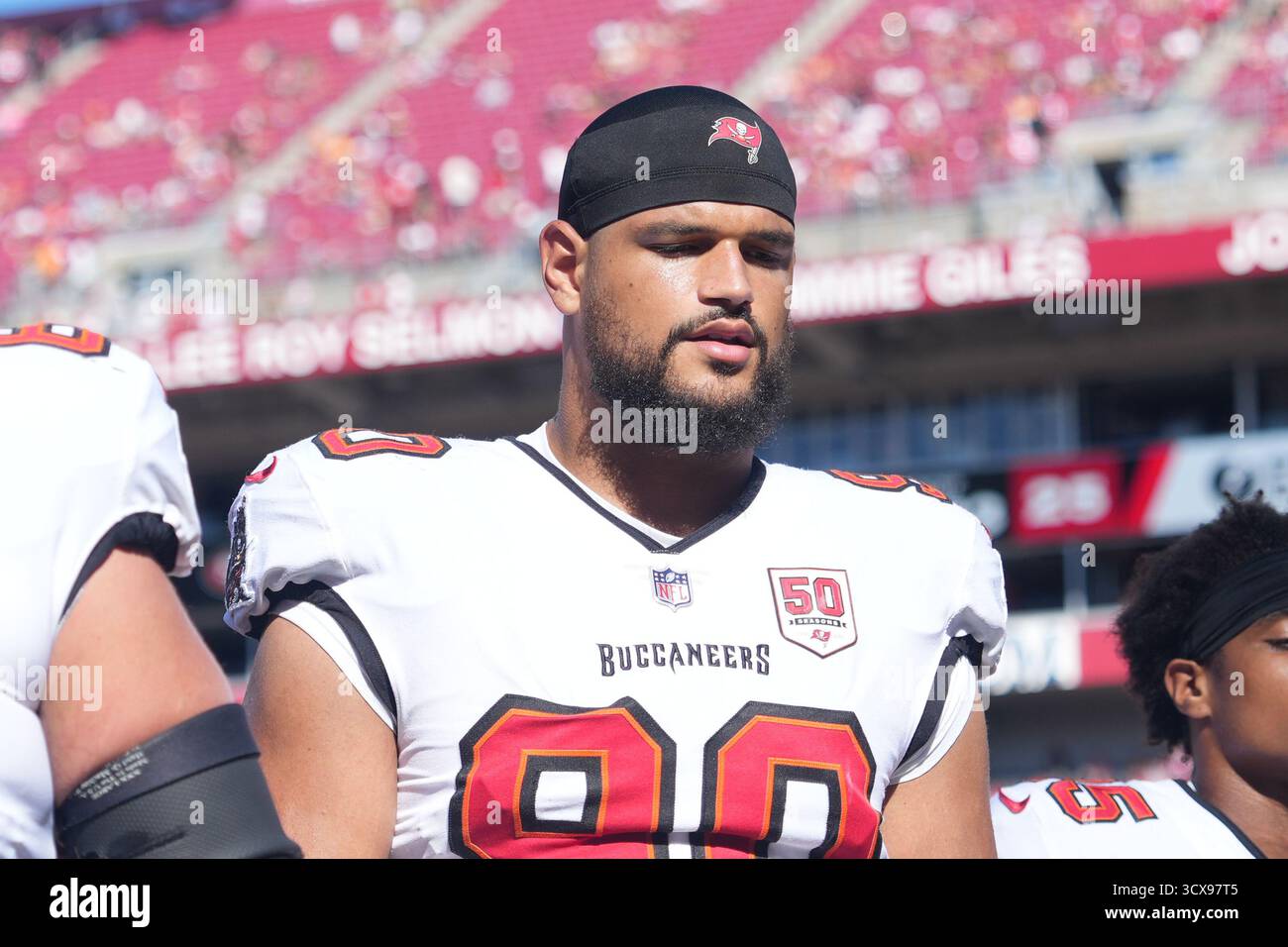 Tampa Bay Buccaneers defensive end Logan Hall (90) leaves the field ...