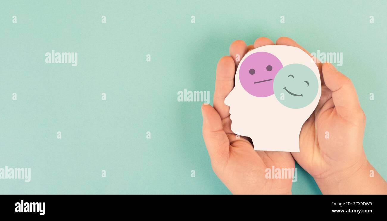 Holding A Head With A Sad And A Happy Face, Mental Health Concept ...