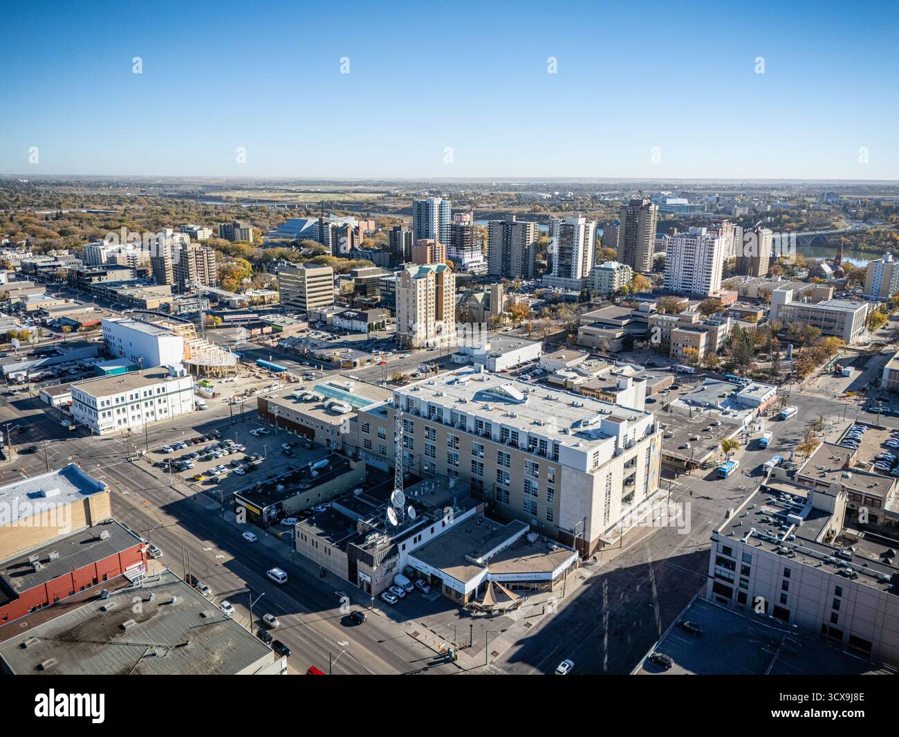 Aerial view of downtown Saskatoon, Saskatchewan, with fall colors along ...