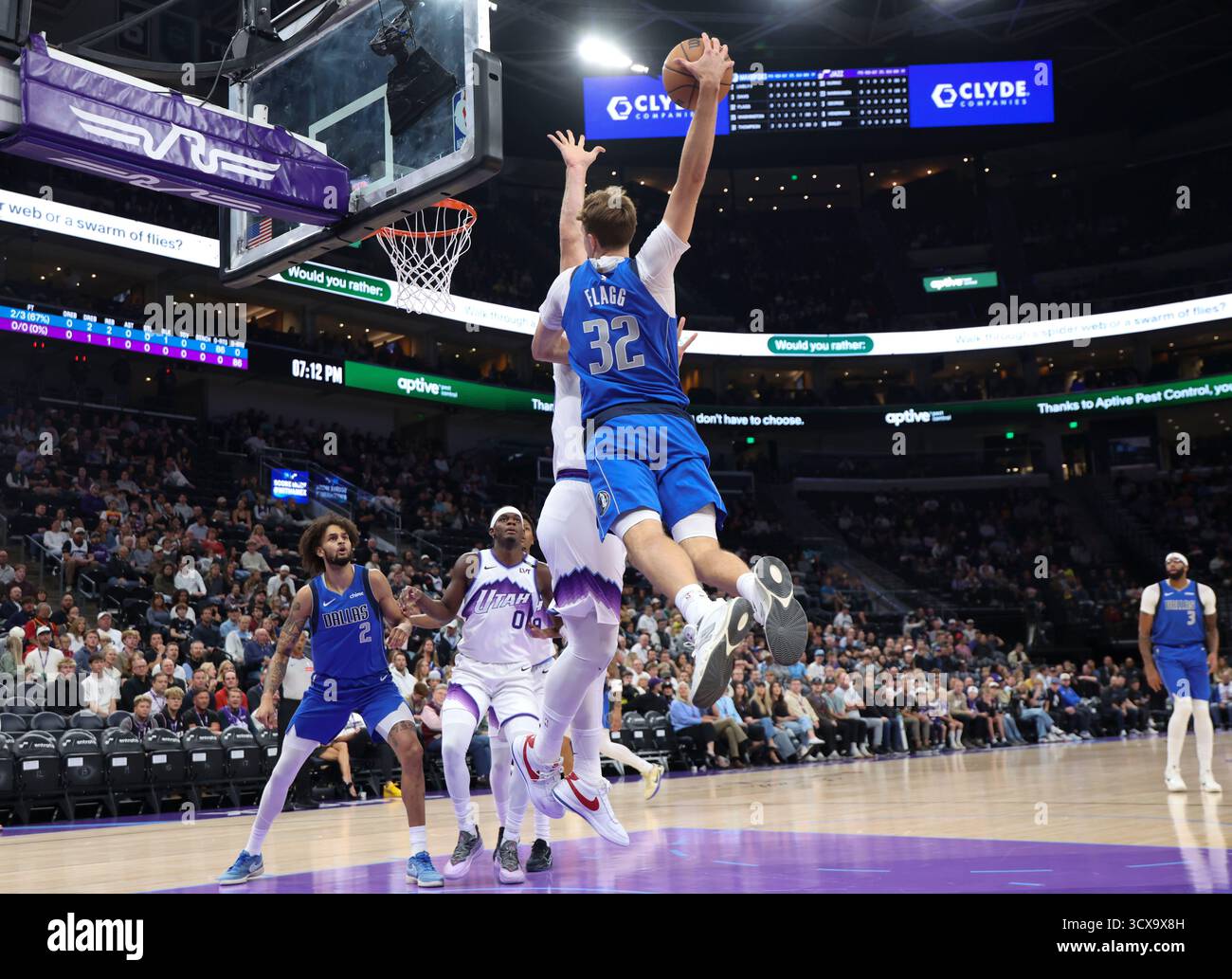 Dallas Mavericks forward Cooper Flagg (32) is fouled by Utah Jazz ...