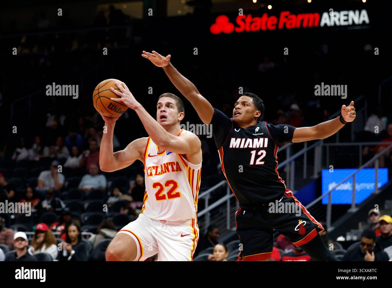 Atlanta Hawks guard Nikola Đurišić (22) looks to shoot as Miami Heat ...