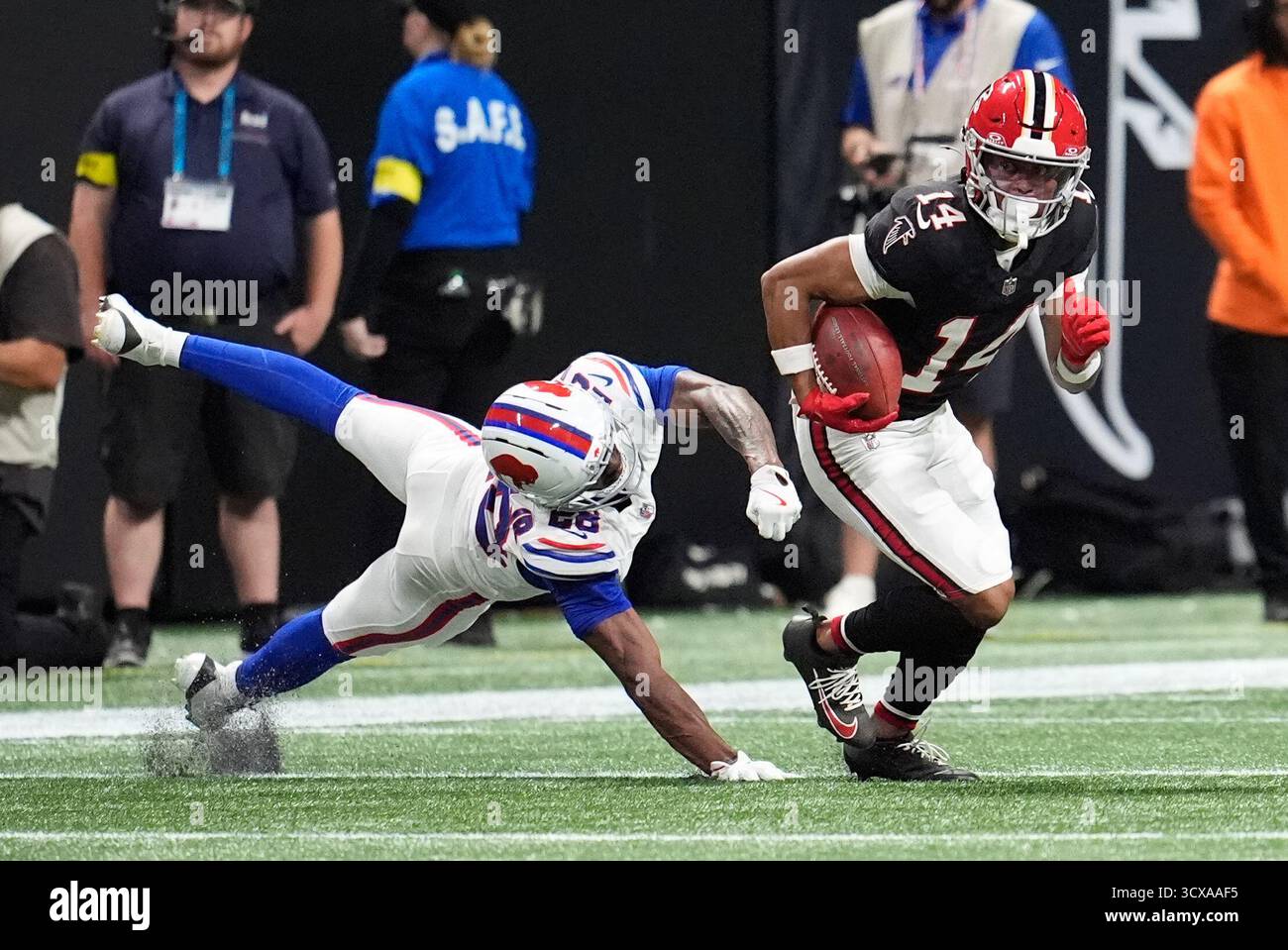 Atlanta Falcons wide receiver Jamal Agnew (14) runs past Buffalo Bills ...