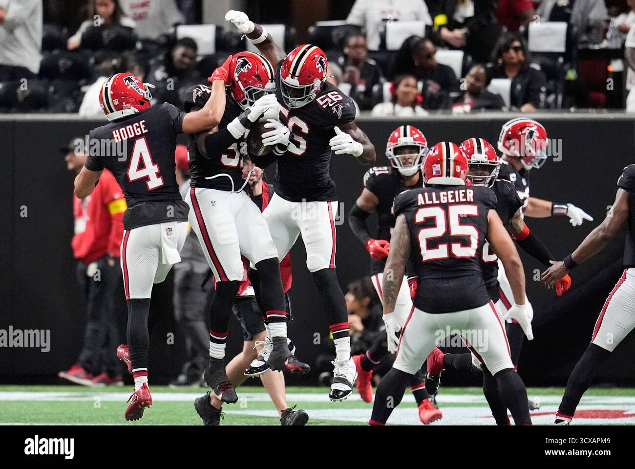 Atlanta Falcons linebacker Deangelo Malone, second from left ...