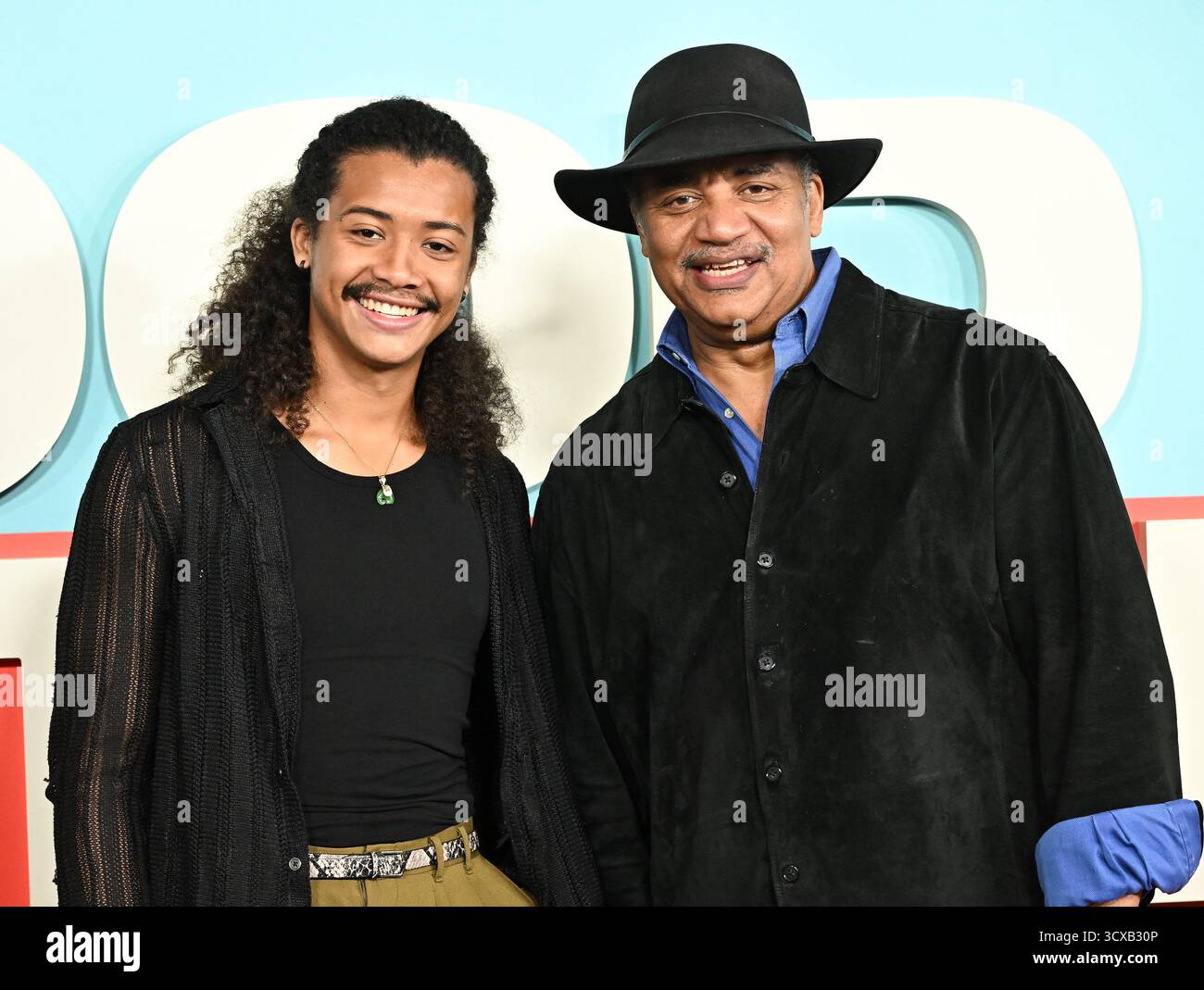 Travis Tyson, left, and Neil deGrasse Tyson attend the special ...