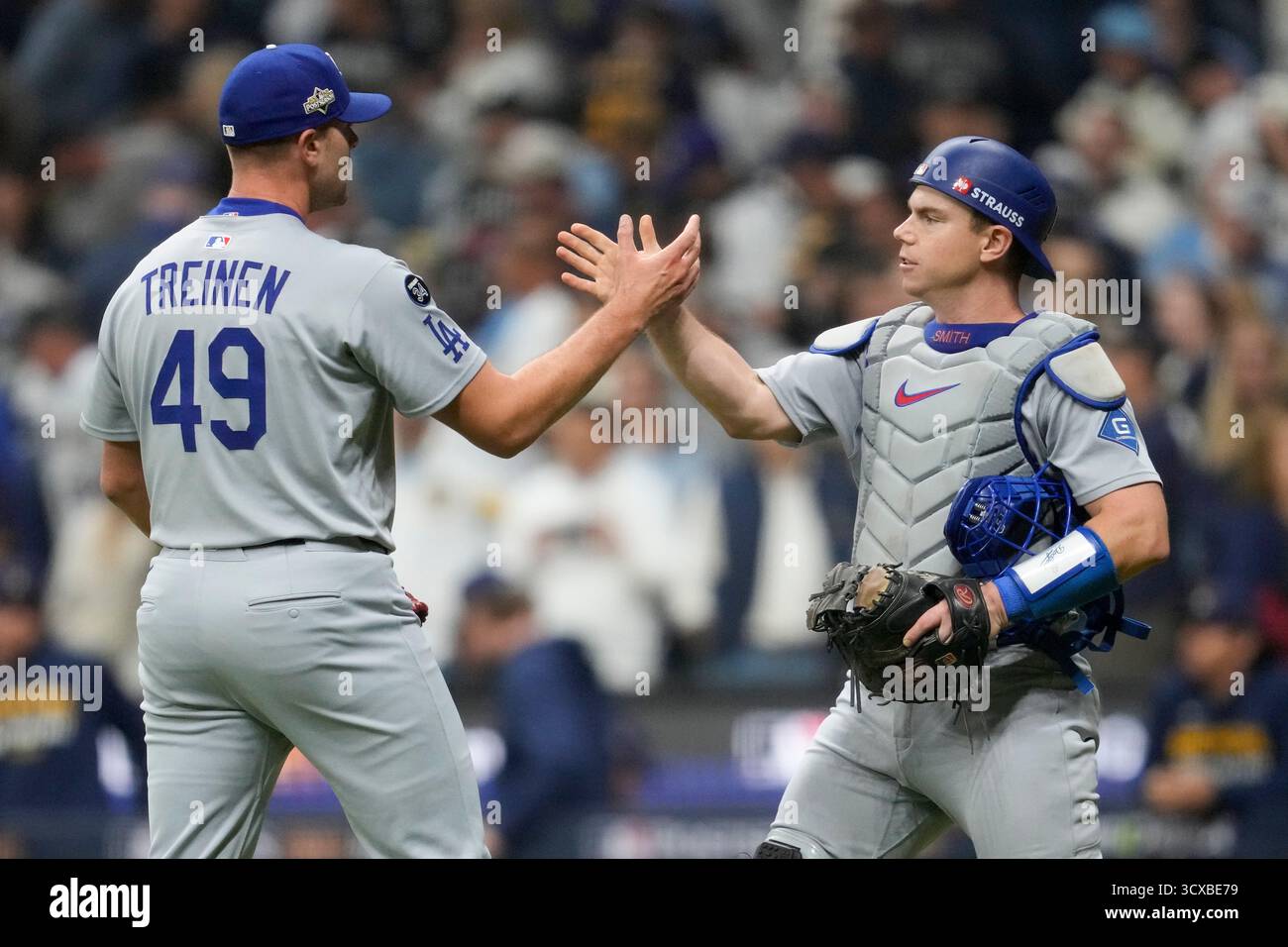 Los Angeles Dodgers pitcher Blake Treinen celebrates their win against ...
