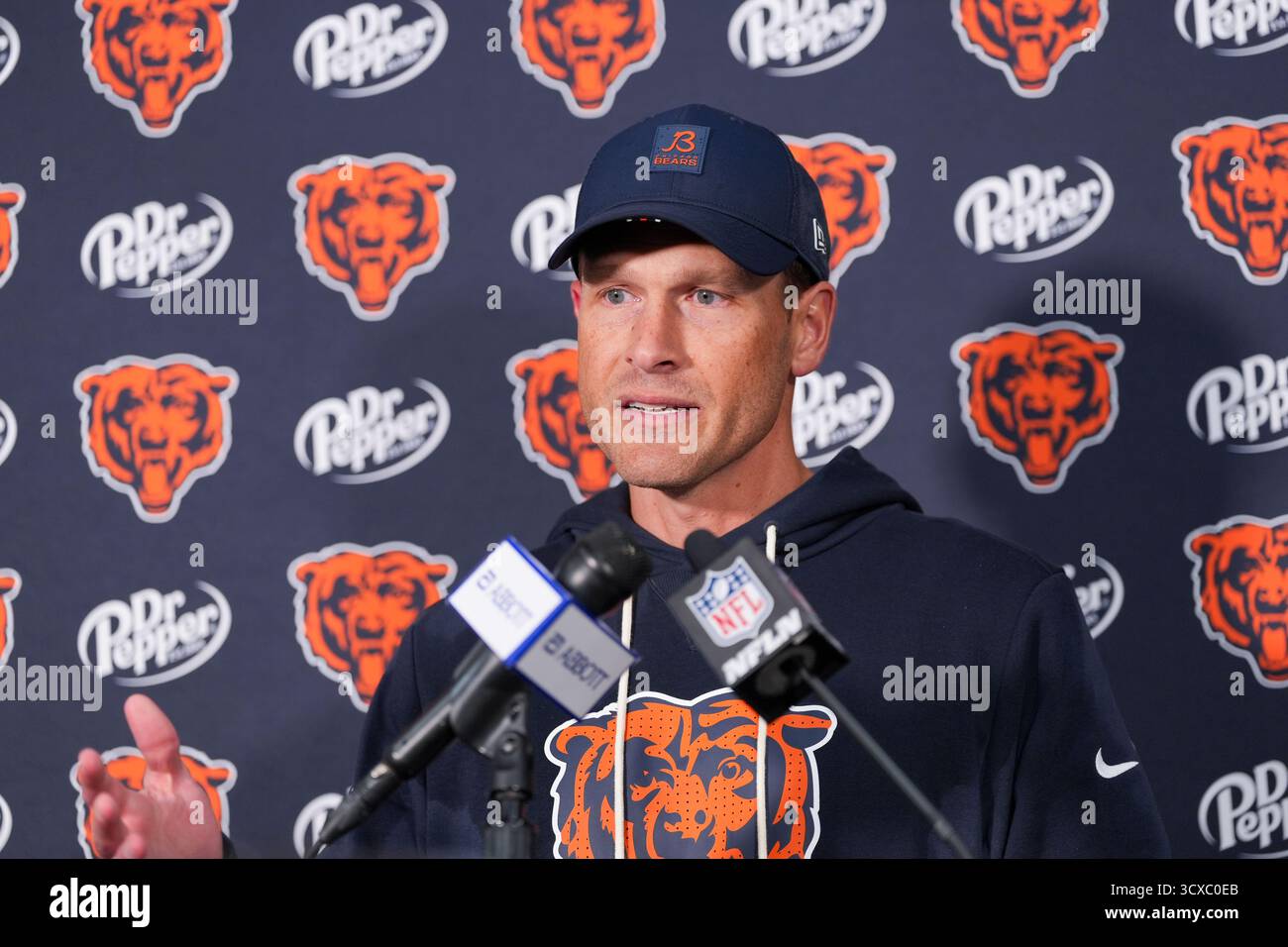 Chicago Bears head coach Ben Johnson speaks with reporters after an NFL ...