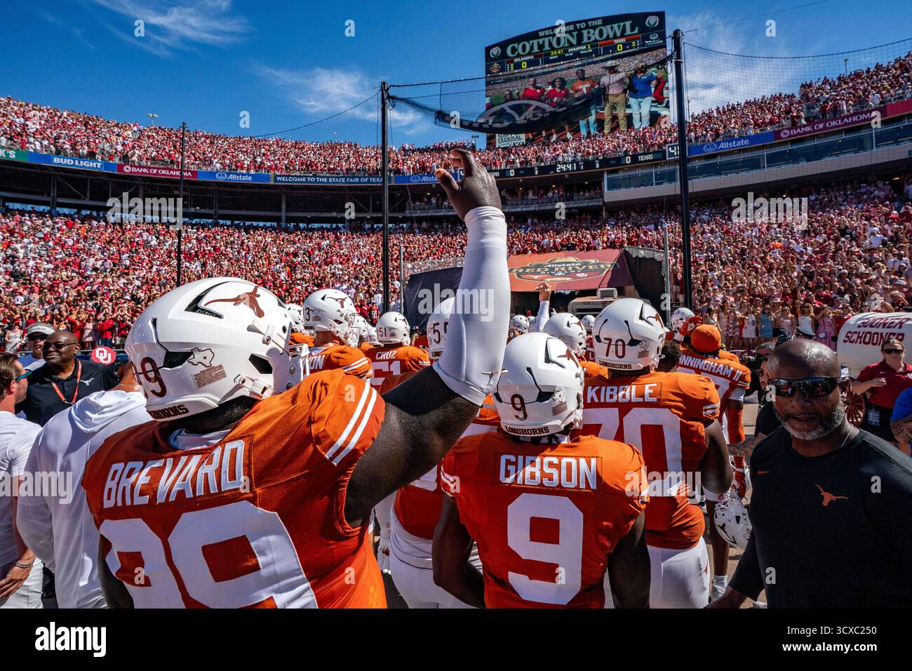 Texas defensive lineman Cole Brevard gestures to the Oklahoma crowd ...