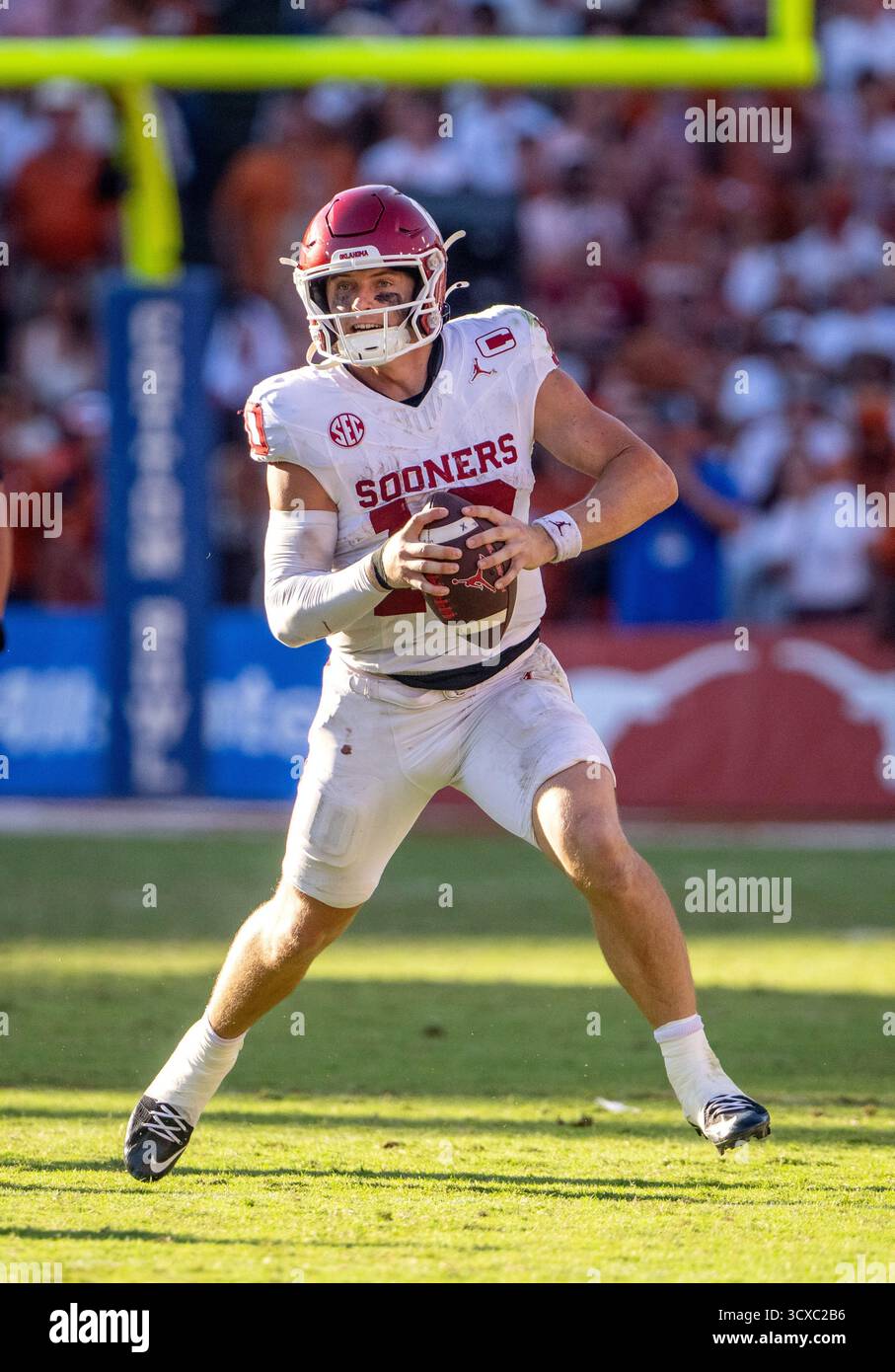 Oklahoma quarterback John Mateer rolls out to pass during the second ...