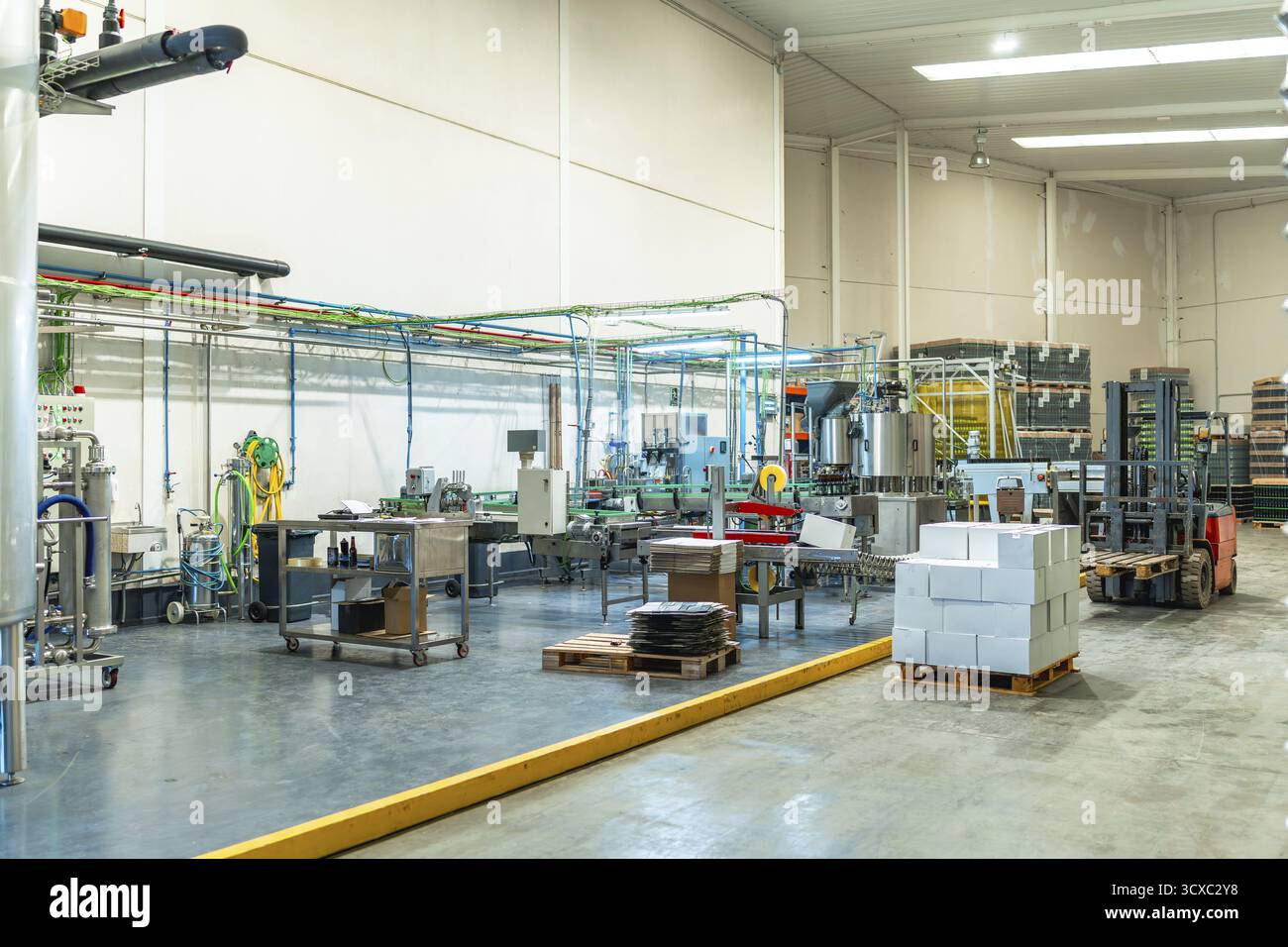 Industrial brewery interior featuring automated production lines ...