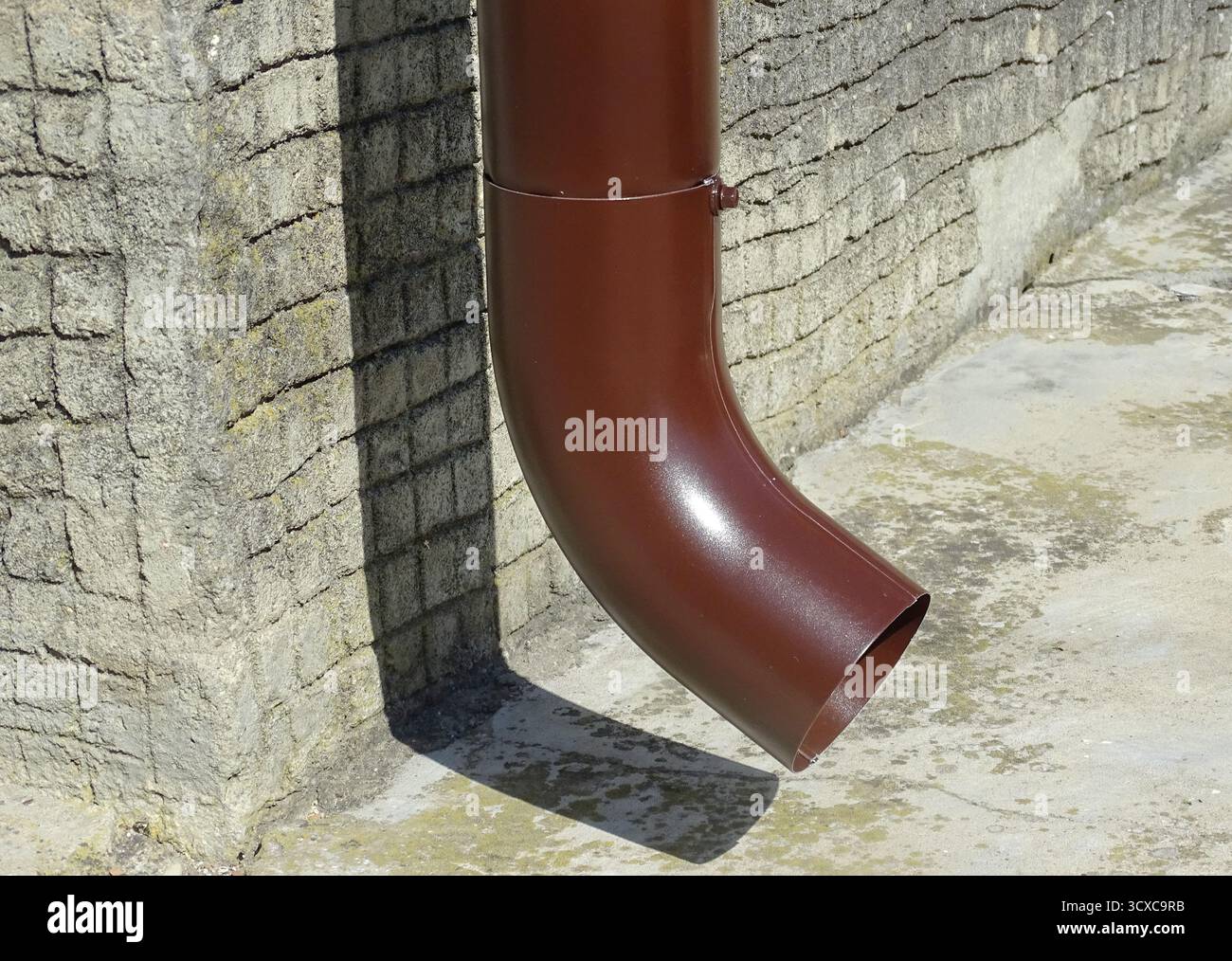 Gutter connection elbow for rainwater system Stock Photo - Alamy