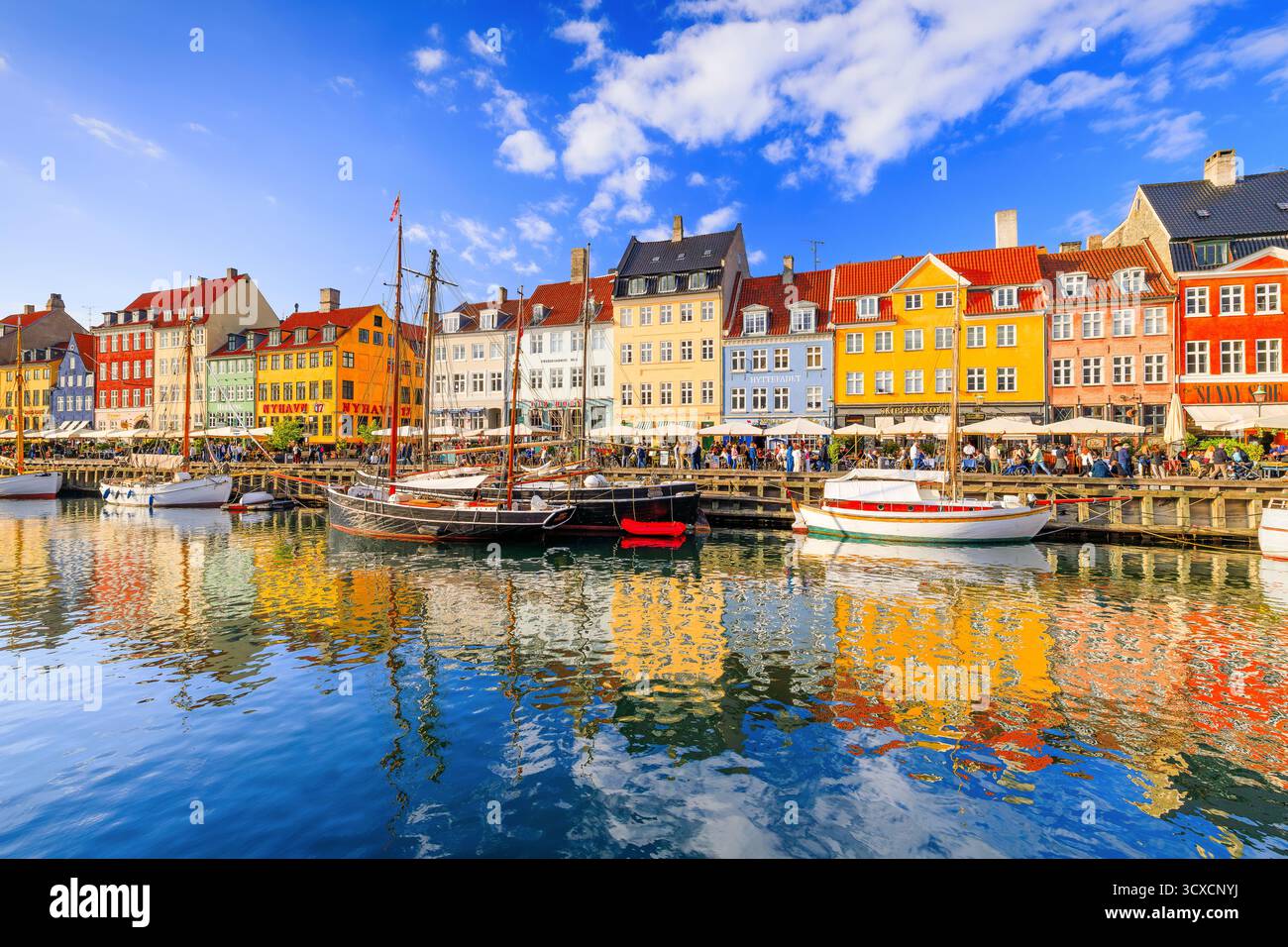 Copenhagen, Denmark - May 12, 2025: Nyhavn waterfront, colourful ...