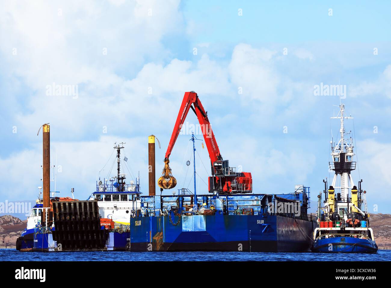 Silur a 101 metre long Cargo Barge working along side tugs in the Sound ...