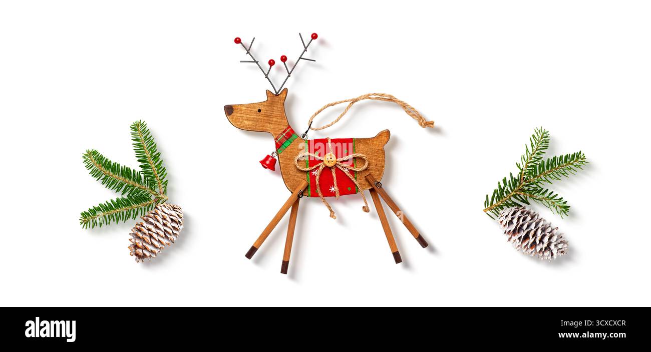 Wooden Reindeer Ornament with Pine Branches and Snow Cones Stock Photo ...