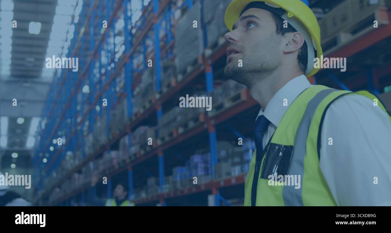 Warehouse supervisor wearing yellow hi-res stock photography and images ...