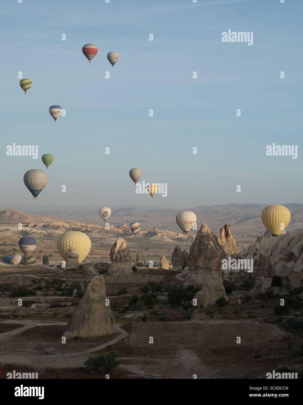 Goreme, Turkiye - 11 October 2019: View of hot air balloons drift ...