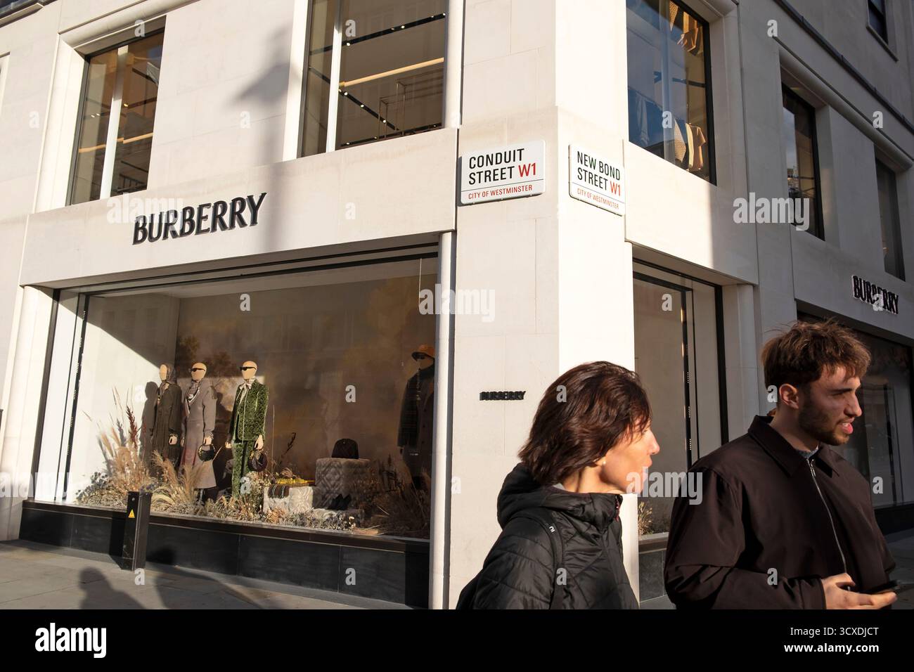 Burberry store exterior and people shopping shoppers on New Bond Street ...
