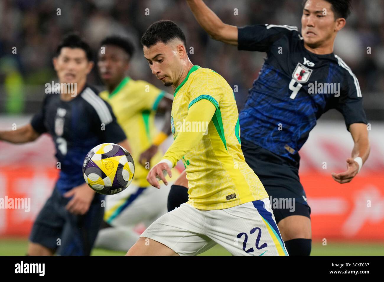 Brazil's Gabriel Martinelli, center, controls the ball during the ...