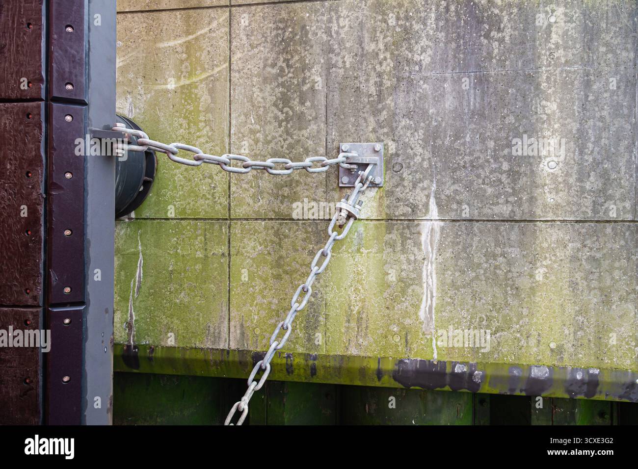 Concrete berth of the seaport with a fender to protect the ship's hull ...