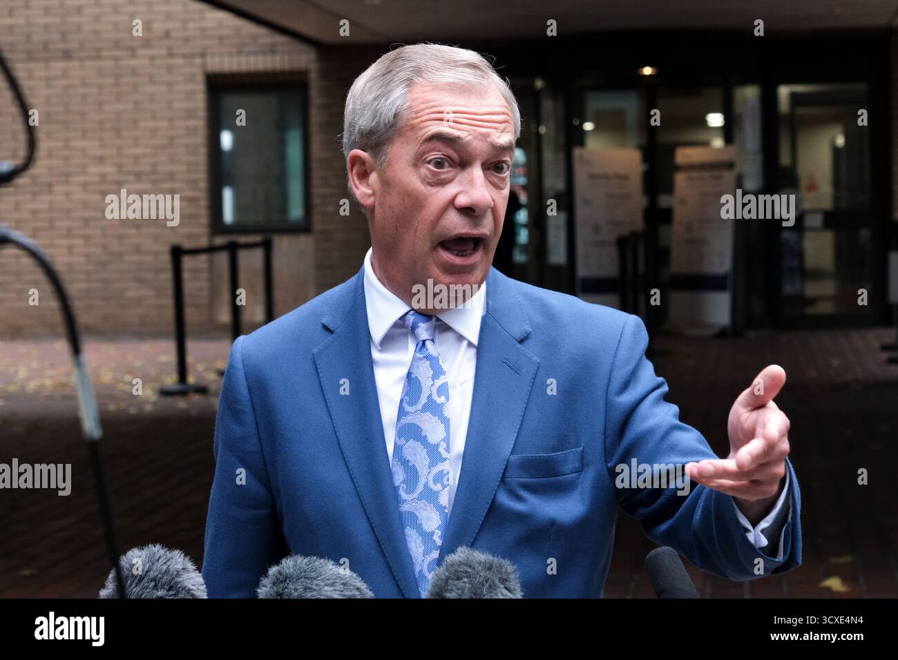 Southwark Crown Court, London, UK. 14th Oct 2025. Nigel Farage outside ...