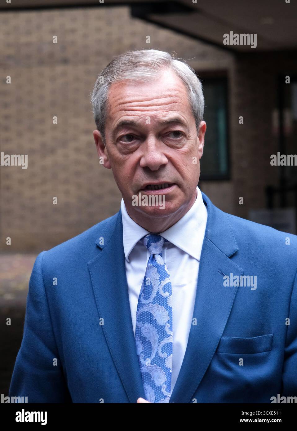 Southwark Crown Court, London, UK. 14th Oct 2025. Nigel Farage outside ...