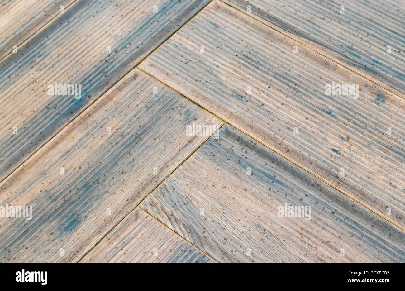 Wooden pool deck with rain drops on it Stock Photo - Alamy