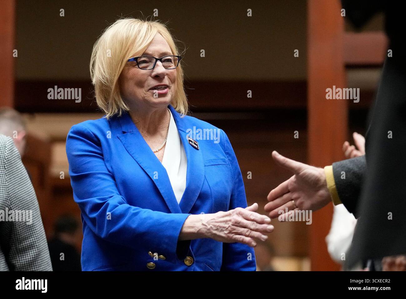 FILE - Democratic Gov. Janet Mills, greets lawmakers prior to ...