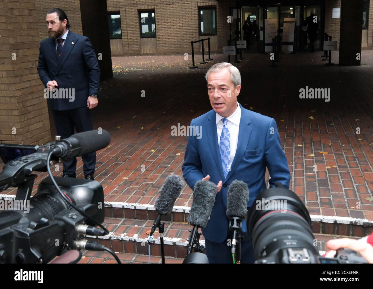 Southwark Crown Court, London, UK. 14th Oct 2025. Nigel Farage outside ...