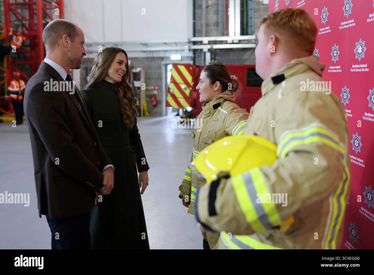 The Prince and Princess of Wales speak with firefighters during a visit ...